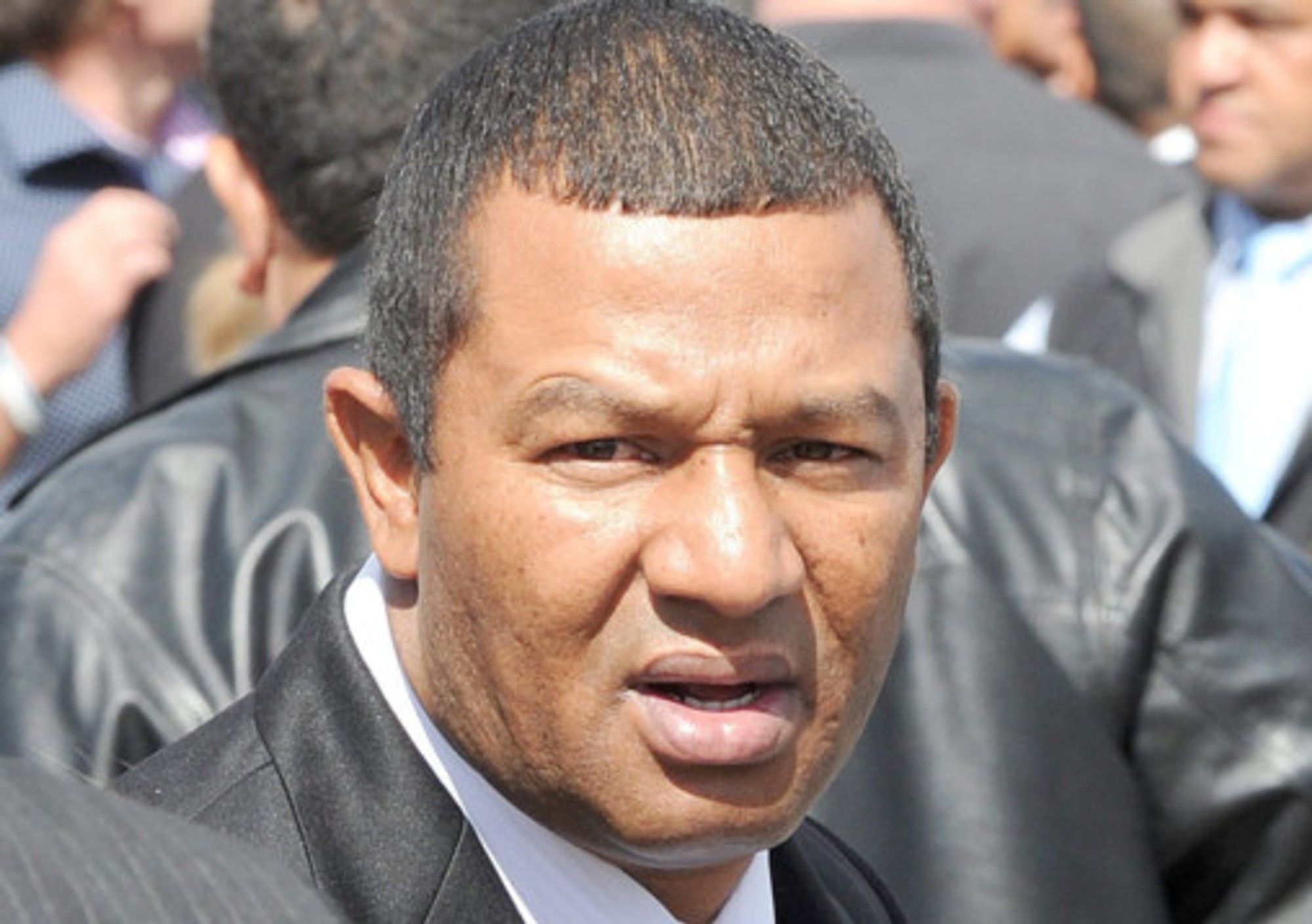 Why was gang boss at tyre shop attack site?