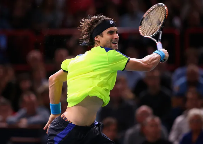 Ferrer splits with long-time coach
