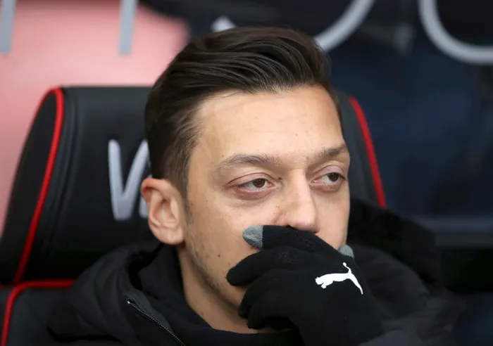 Put your back into it, Emery tells Ozil