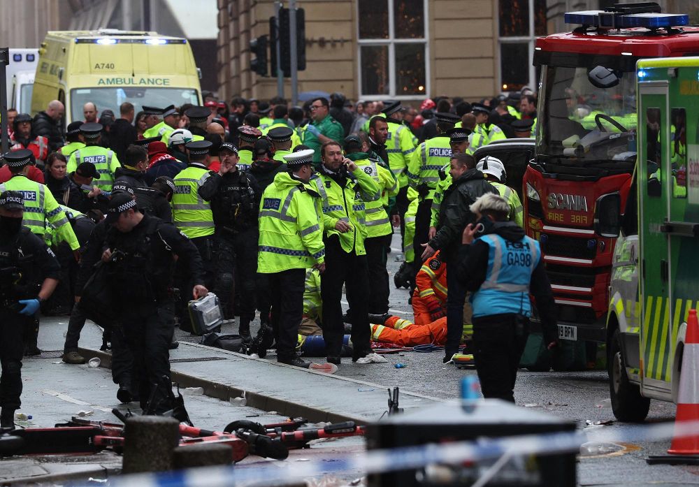 Man accused of Liverpool parade crash in tears as trial opens