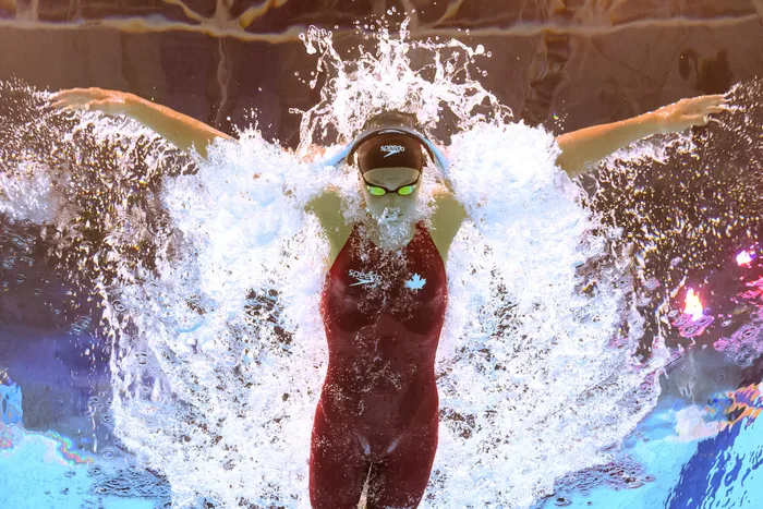 Teens Popovici and McIntosh grab world swimming golds as Dressel quits