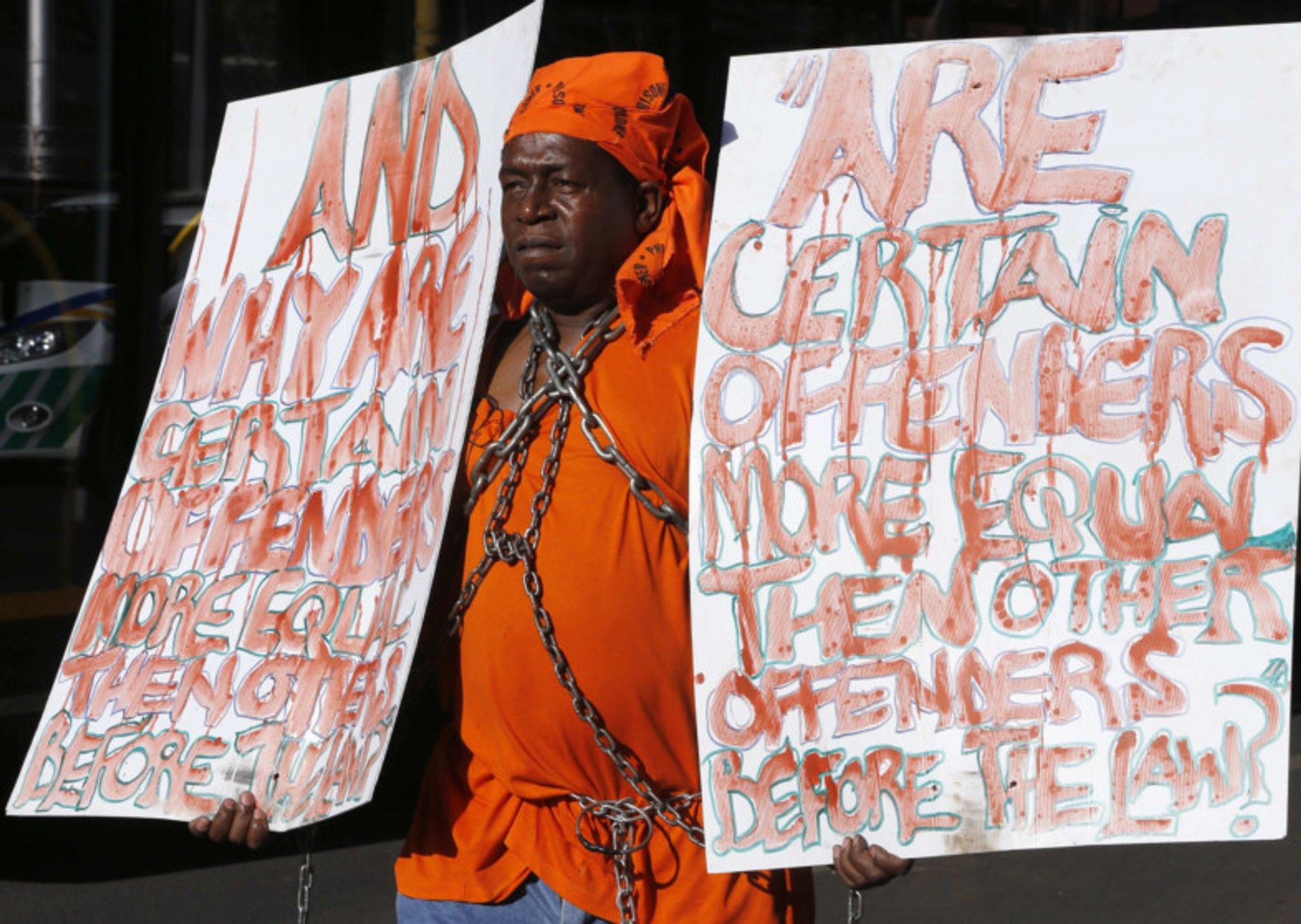Shackled activist outside Oscar court