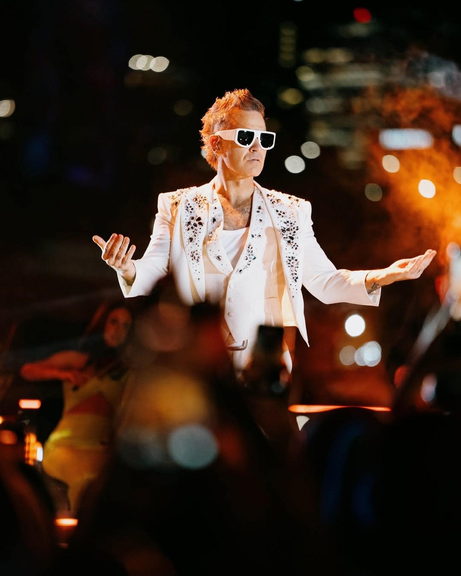 Why this millennial gets Gen X's obsession with Robbie Williams' 90s hits