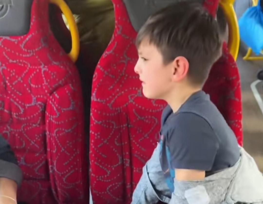 WATCH: Stranger who reprimands little boy on bus goes viral