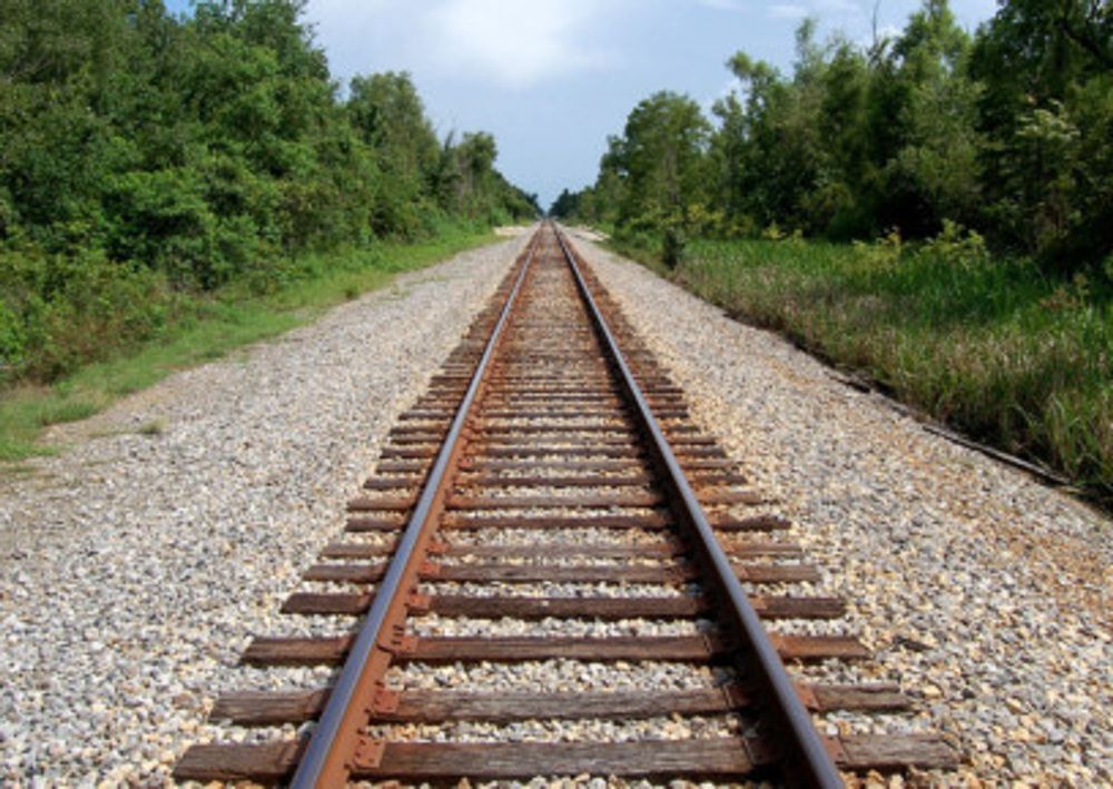 Car plunges onto tracks