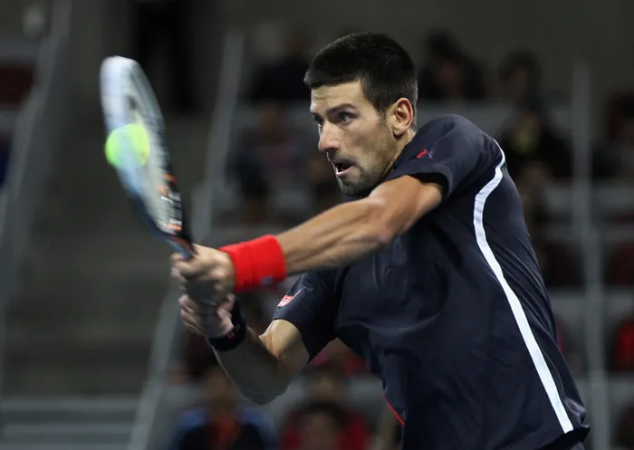 Djokovic advances at China Open