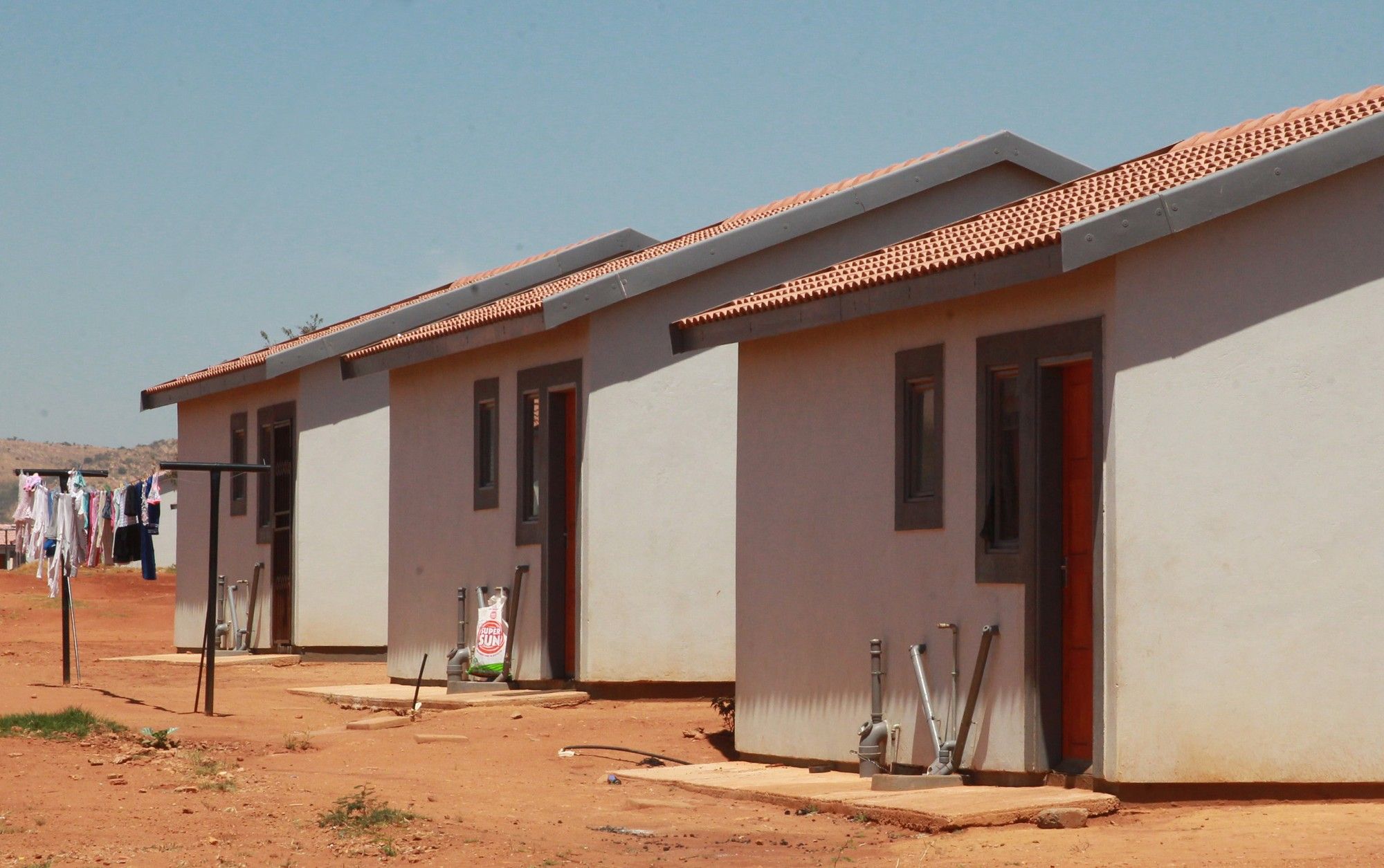 Rama City residents fight for basic infrastructure development, title deeds