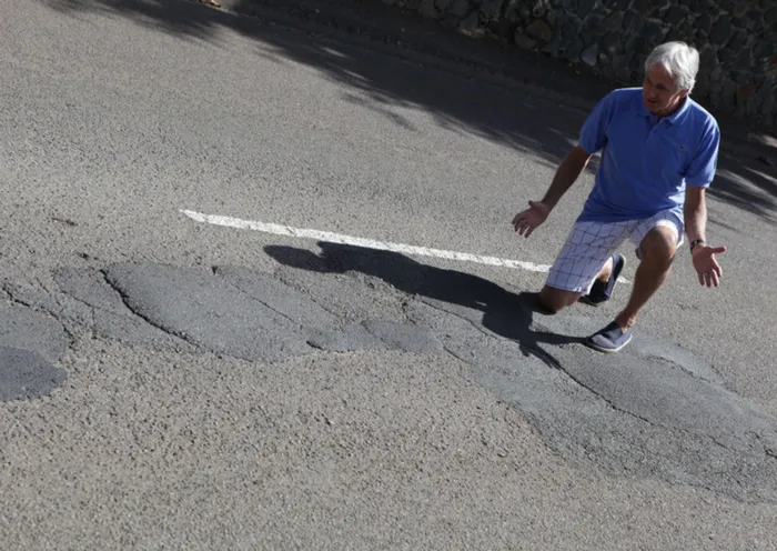 Cyclist wins battle over pothole injury
