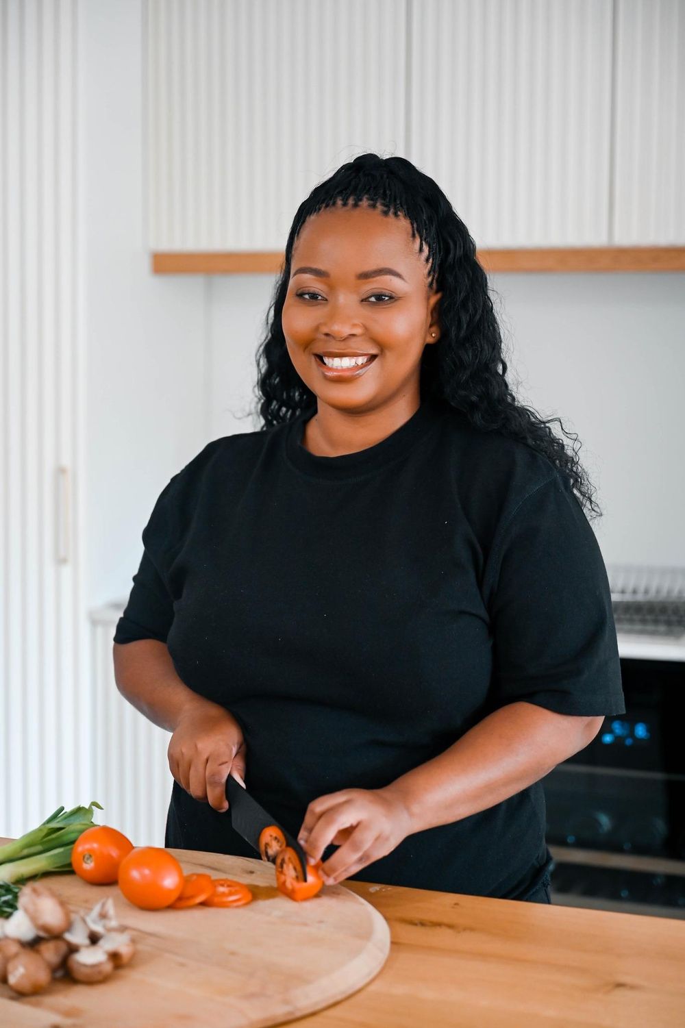 Onezwa Mbola celebrates her mother's culinary legacy in debut cookbook ...