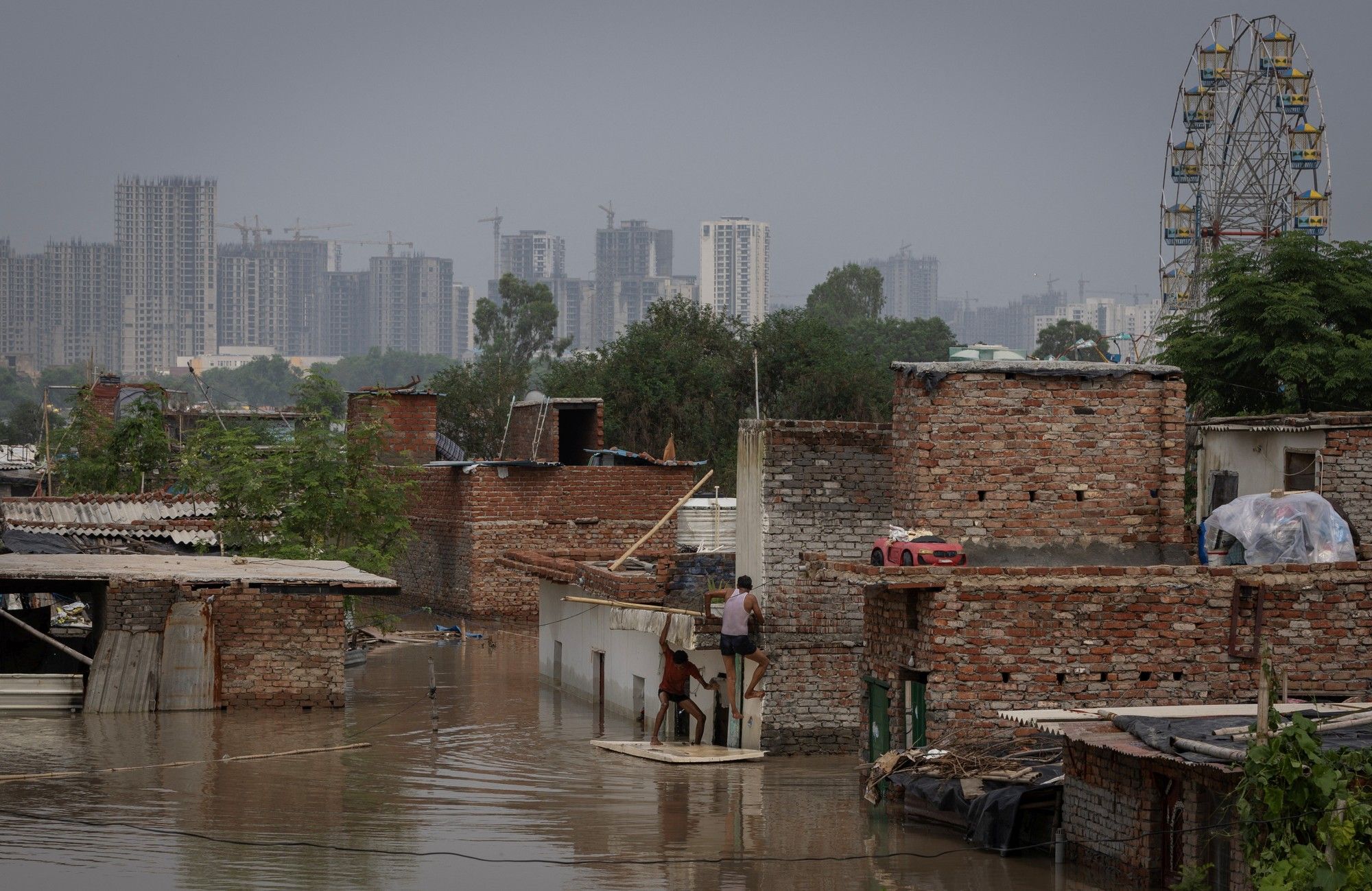 Delhi river reaches record high in monsoon floods