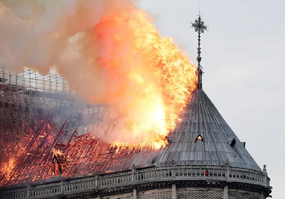 Restoration of famous 12th century Gothic cathedral engulfed by flames ...