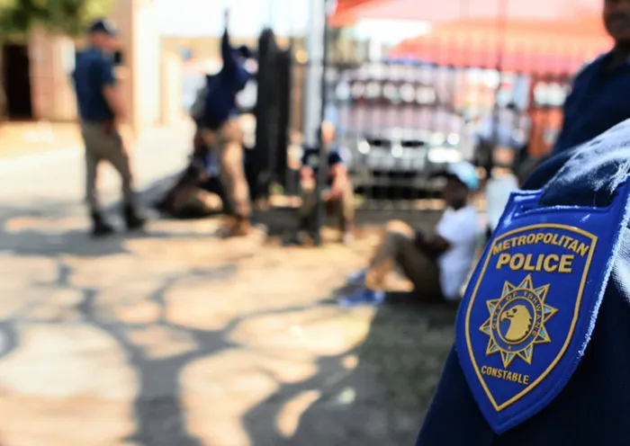 Two held for attack on metro cop