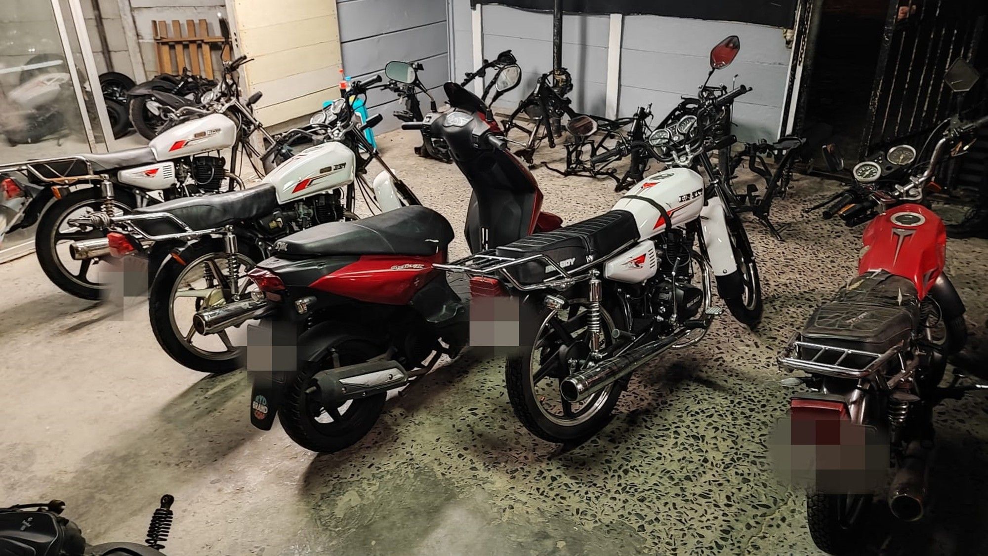 [PICS] Scooter syndicate bust: Bikes and parts in chop shop bound for ...
