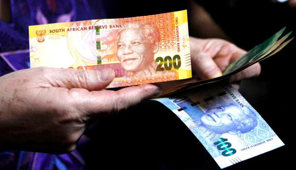 Rand inches higher, remains vulnerable