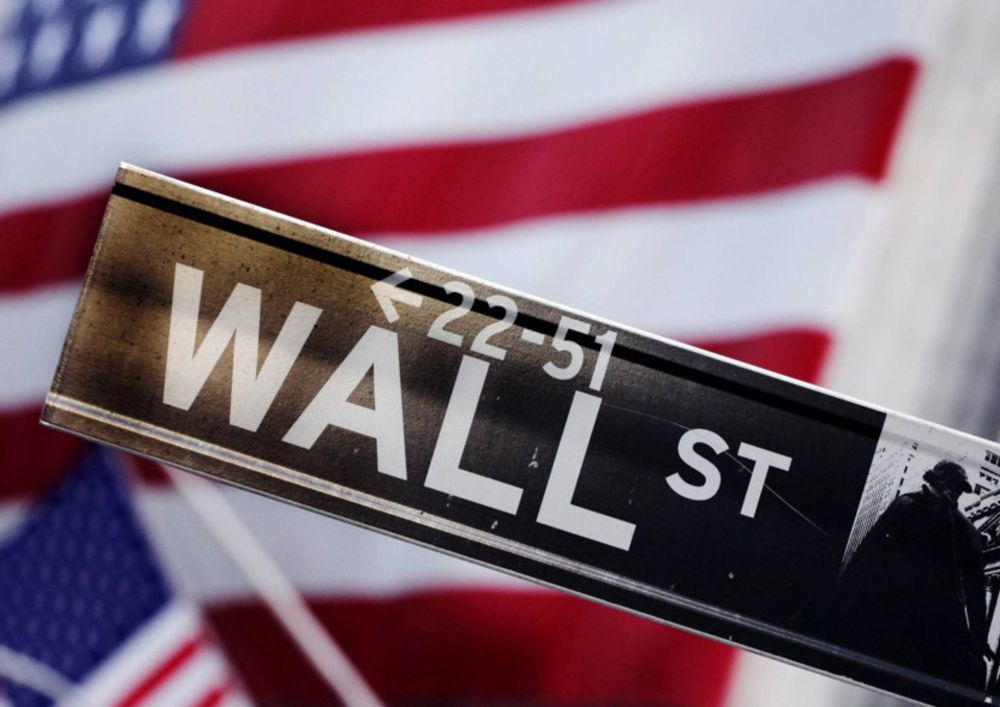 Wall Street dips as biotechs sink Nasdaq