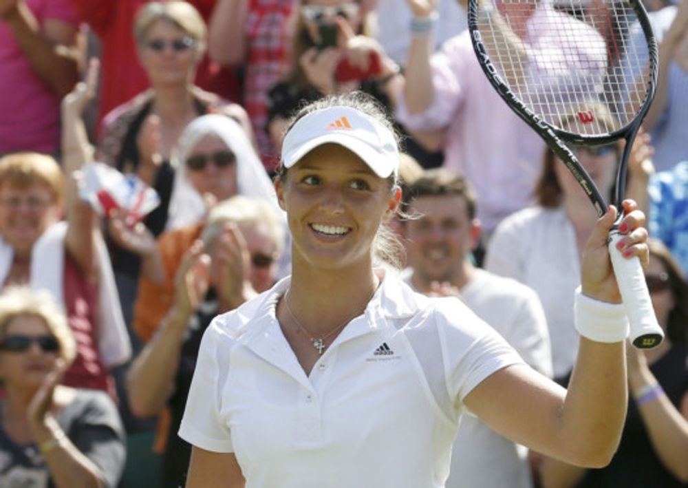 Robson fights back to advance
