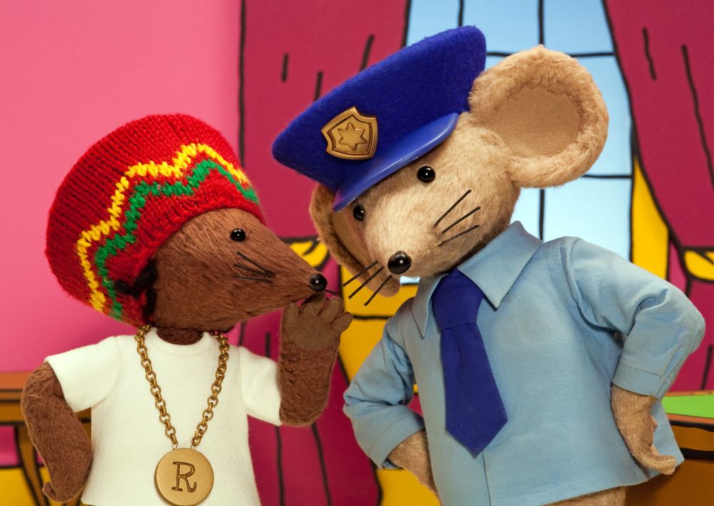 Reggae-loving Rasta rodent on box