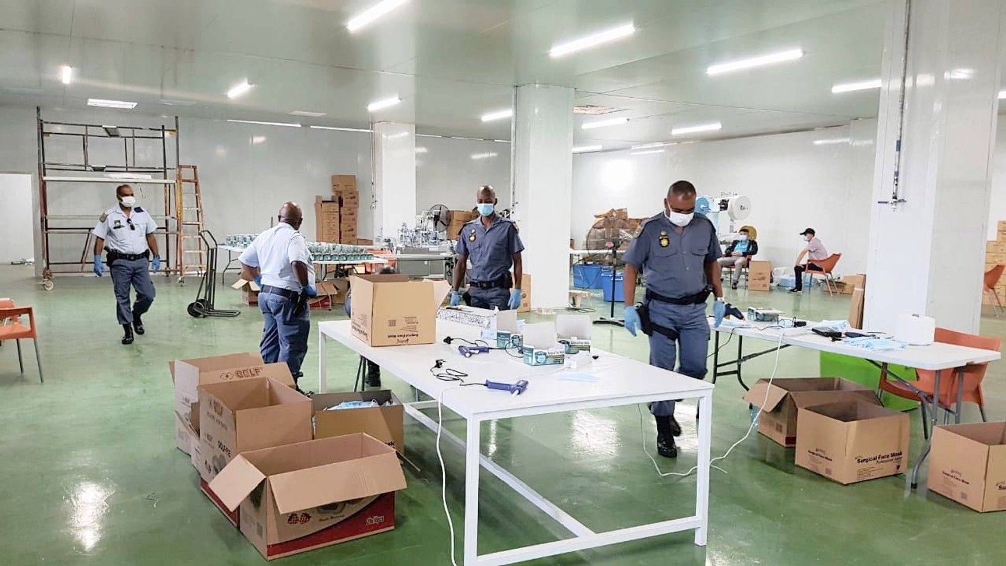 PICS: Businessman arrested after workers locked in factory, forced to ...