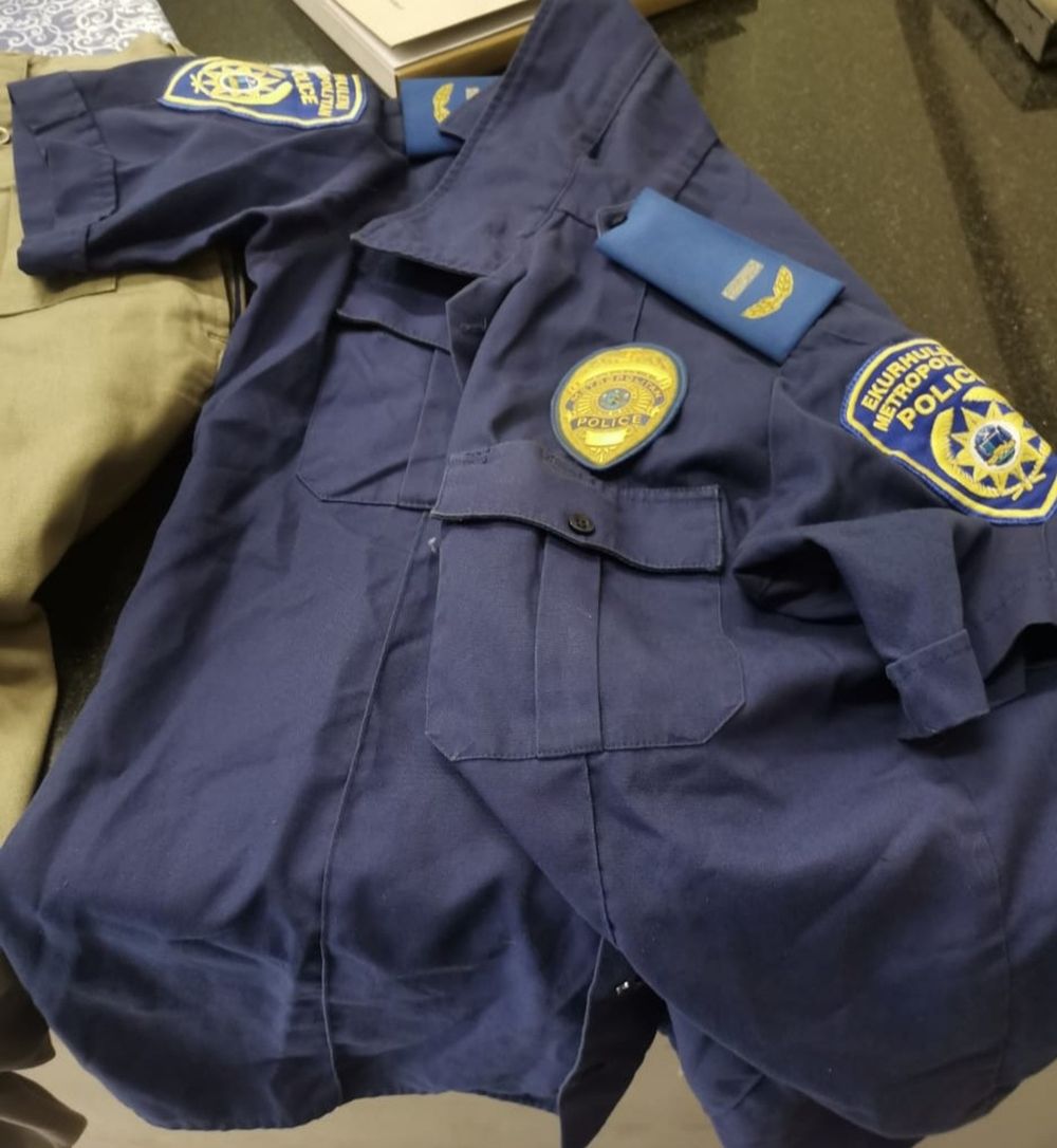 Two arrested after they are found in possession of metro police uniform