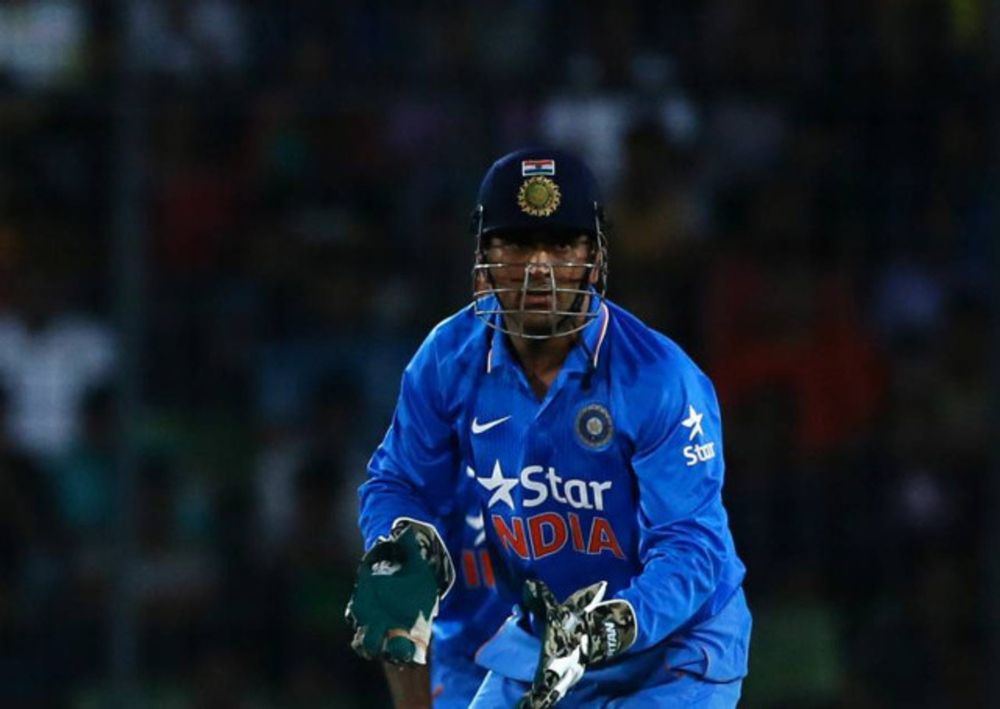 Ashwin defends under-fire Dhoni