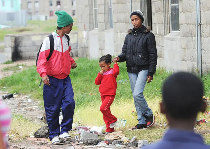 Community standing by evicted family