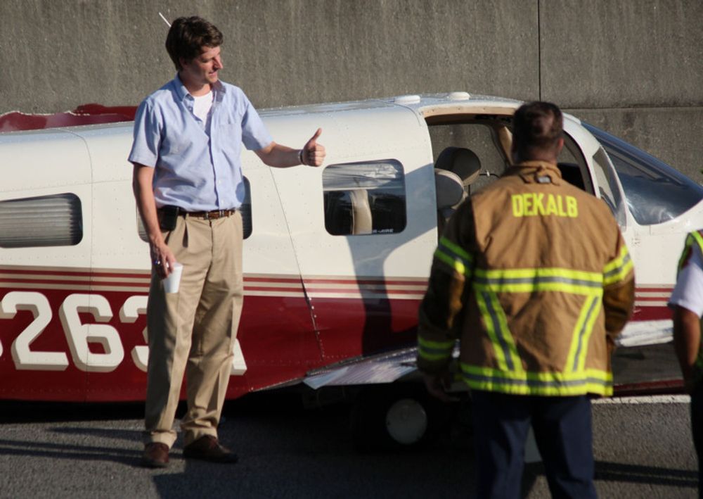 Plane lands on busy highway