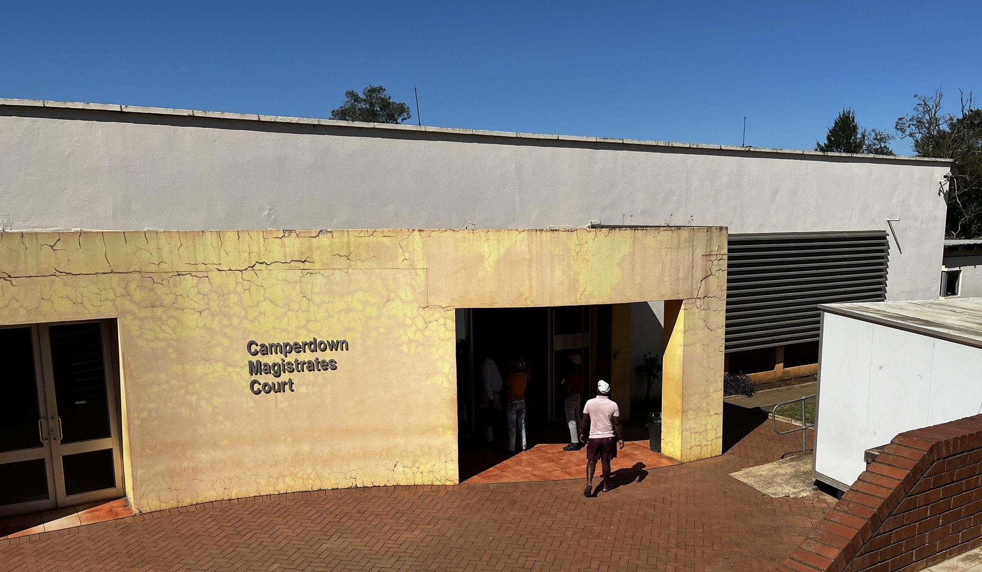 Pre-trial conference delayed for three men accused of murdering former ...