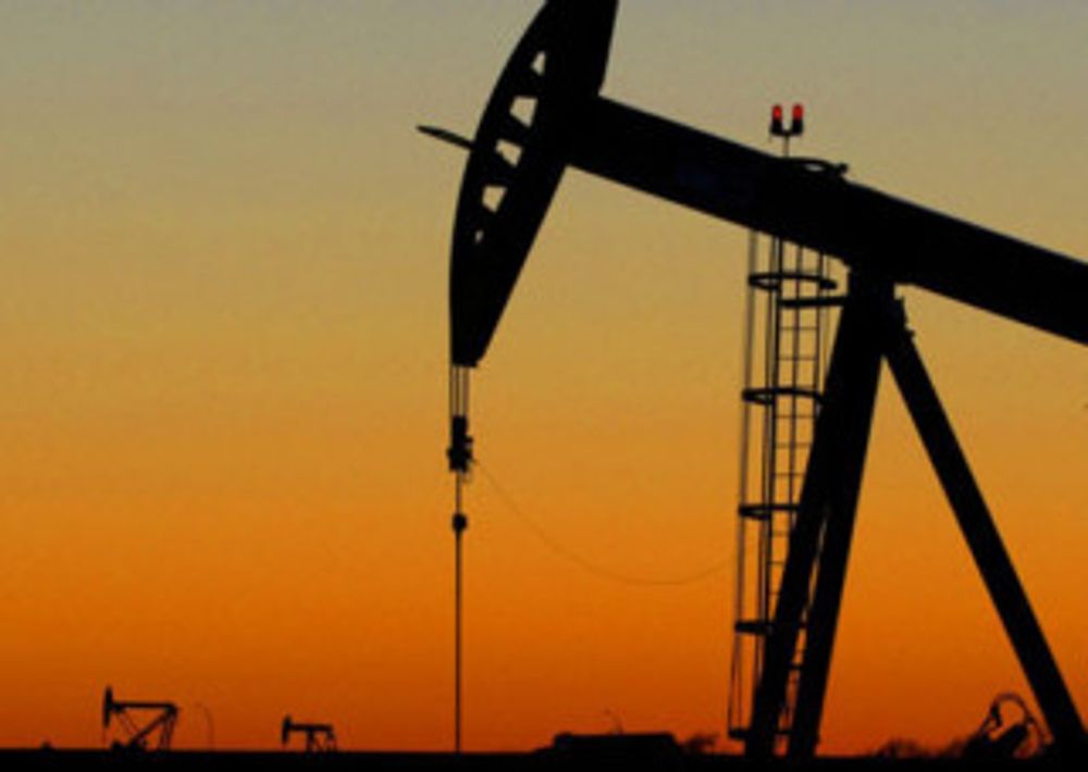 Oil hovers near $98 a barrel
