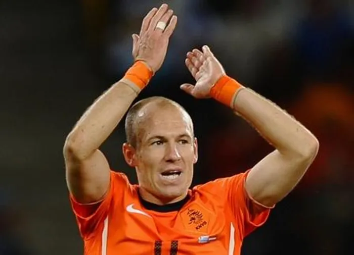 'Oranje' press go mad for Robben's men