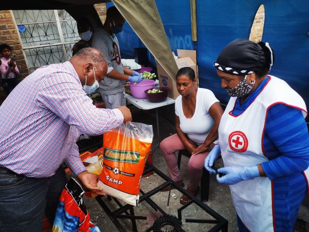 WATCH: Plato gives community worker food, stove and pots