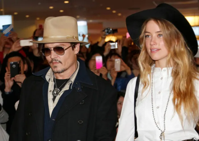 Depp's wife slams 'thugs' in dog saga