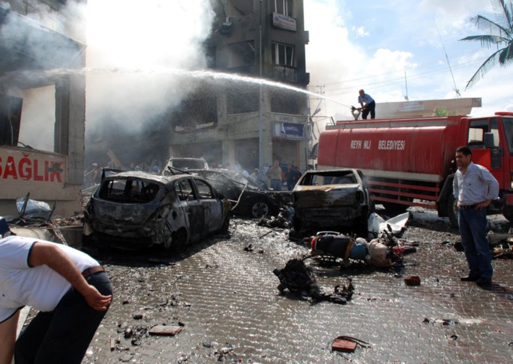 18 dead in car bombing near Syria border