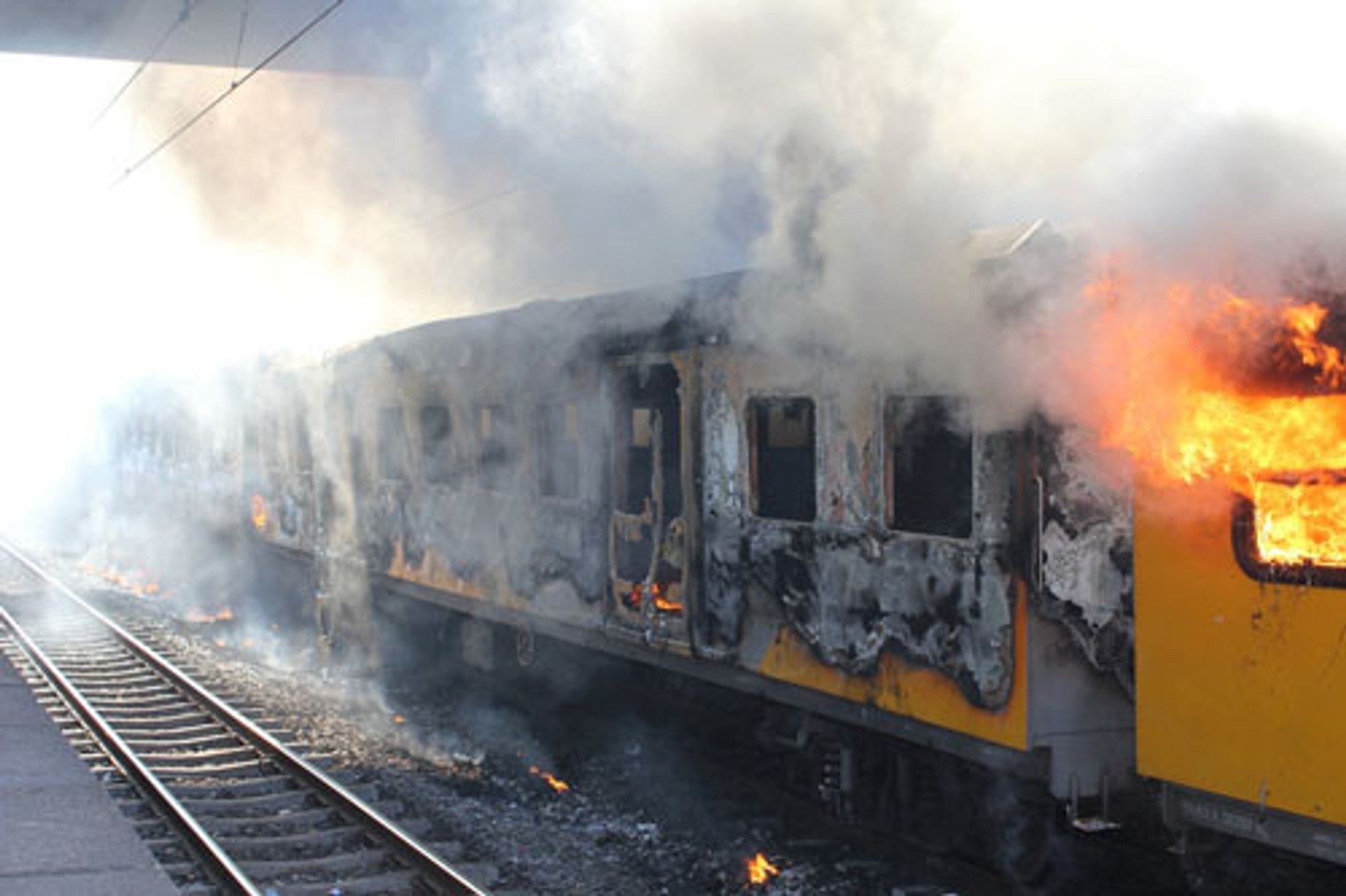 Torching of trains: ‘Make alternative plans’