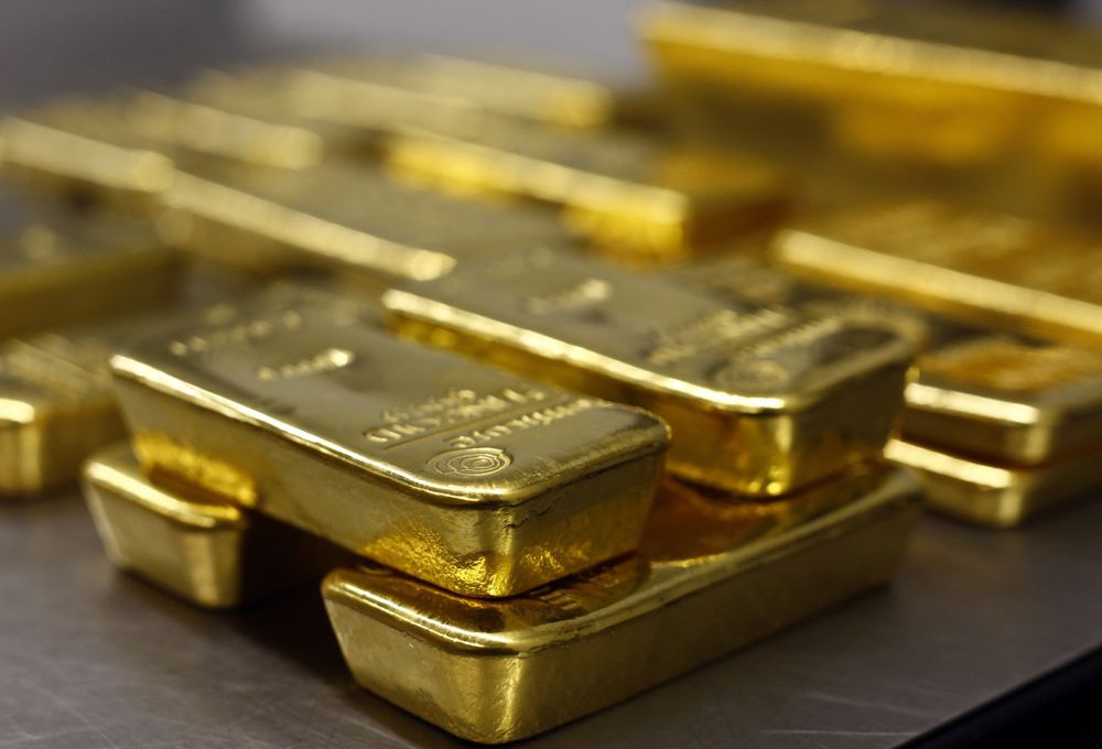 Gold holds near two-week high