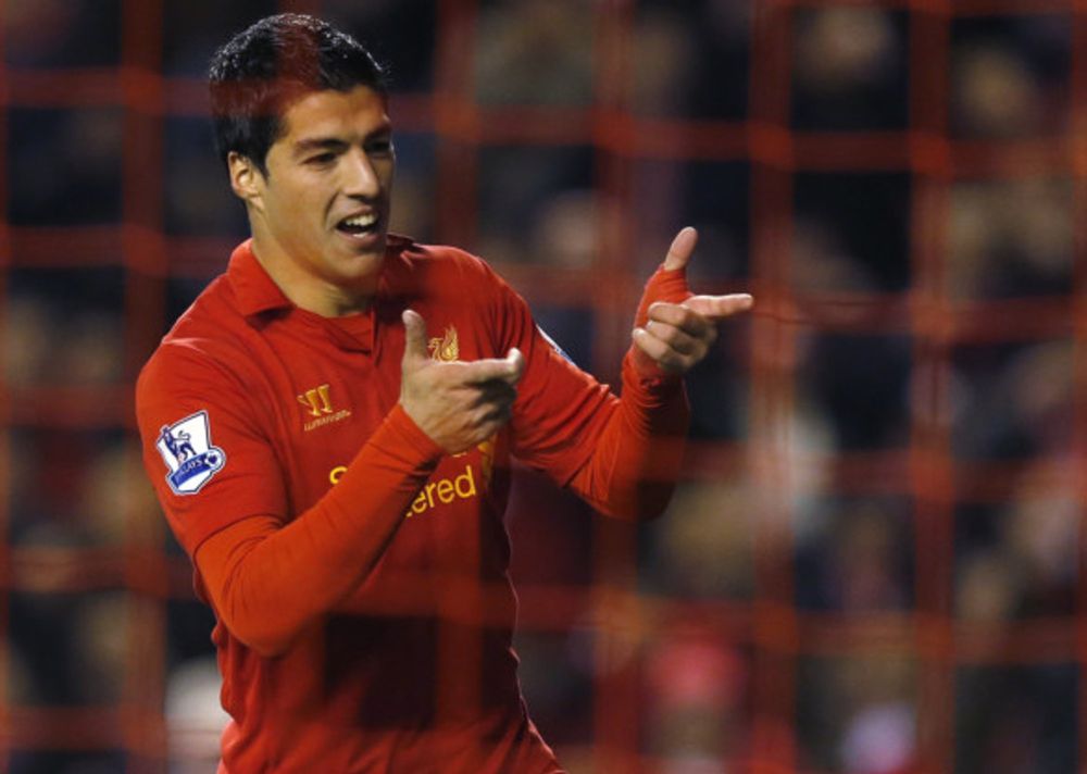 Suarez not giving up on Champions League