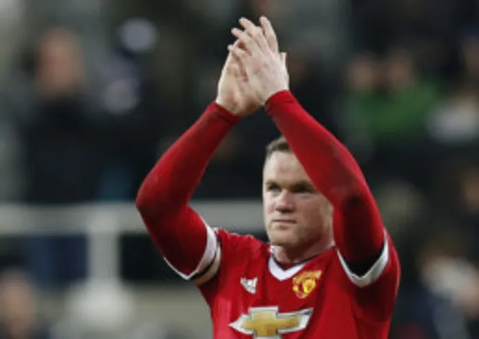 Rooney seeks to keep heat off Van Gaal