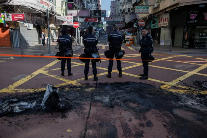 HK protest leader bust with weapons