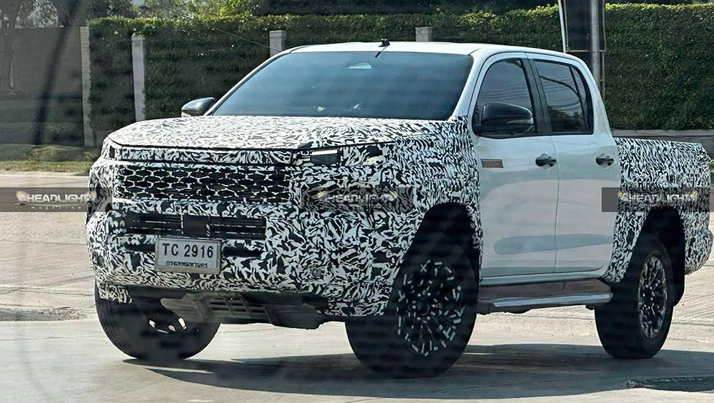 First spy shots of ‘new’ Toyota Hilux shows 2026 model could be an ...