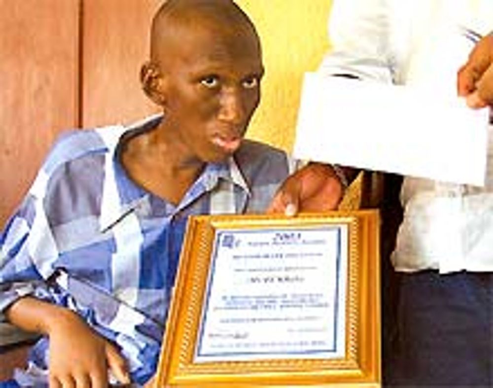 Ailing but defiant HIV+ DJ accepts award