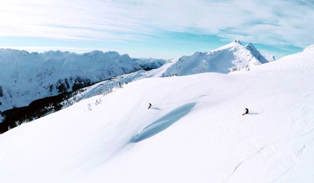 Stopping ski slopes going downhill