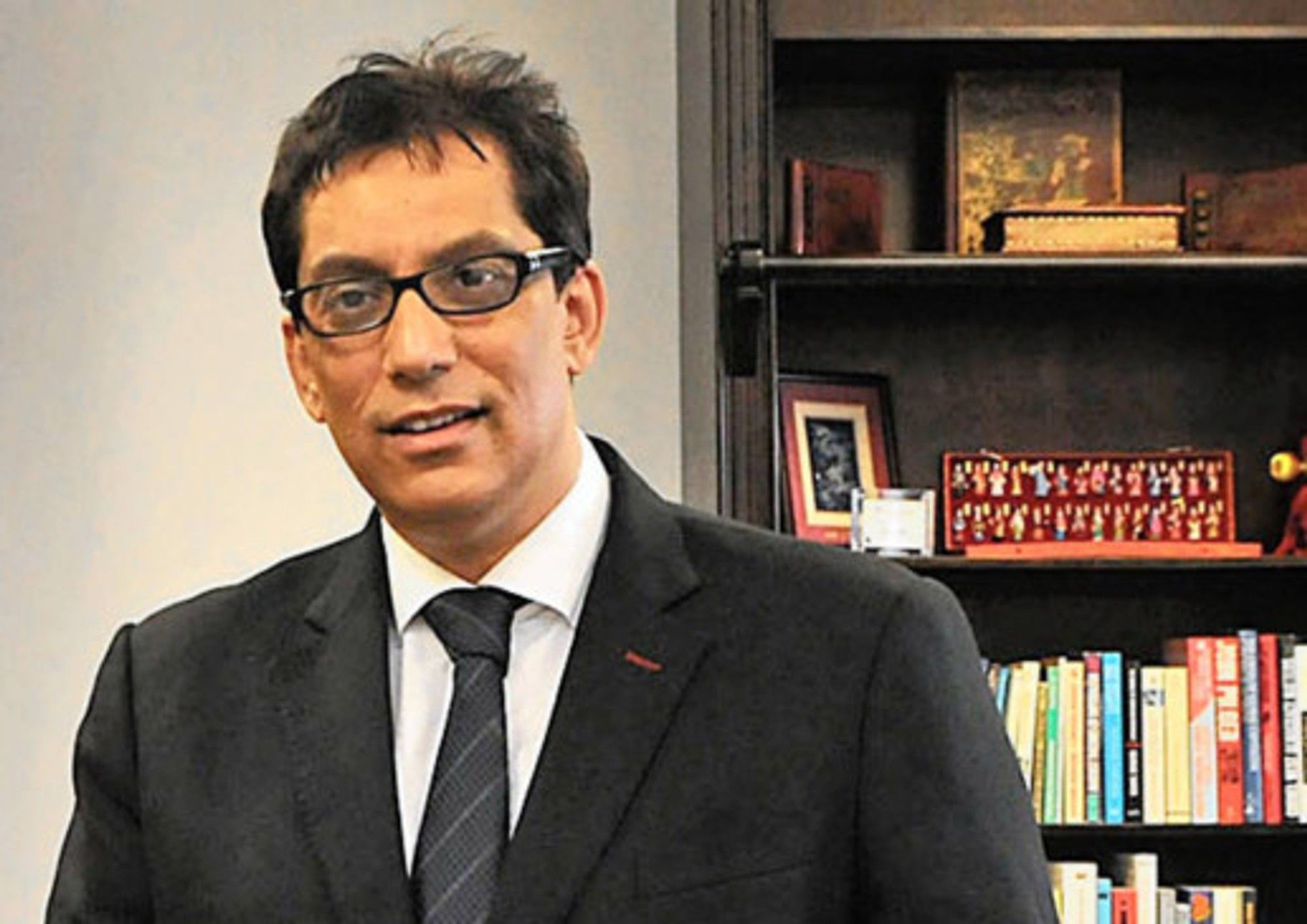 Sekunjalo lays charges over report