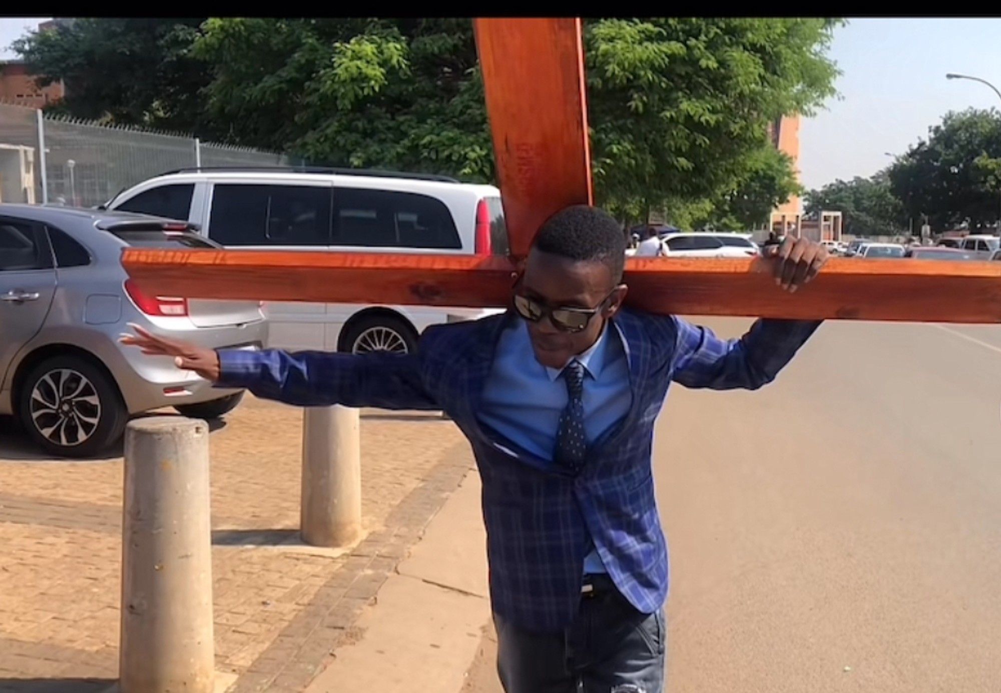 Controversial Pastor Mboro carries cross outside court, claims divine ...