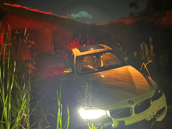 BMW driver loses control and lands in a body of water near King Shaka ...