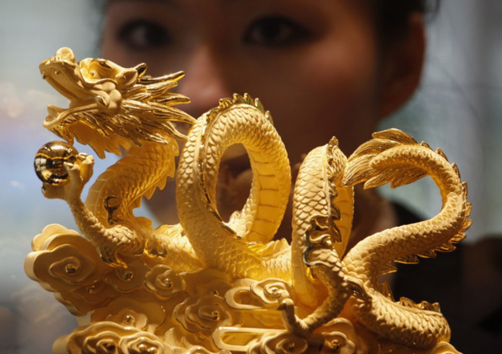 Gold eases from six-week highs