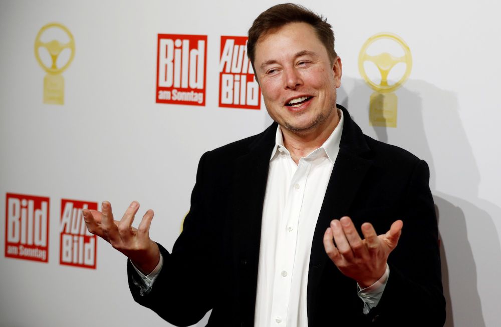Elon Musk returns to Twitter and turns his support to Dogecoin