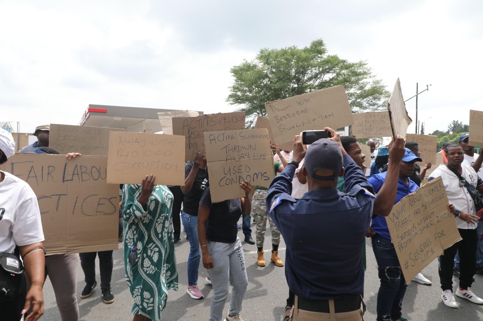 Metro police officers protest against alleged bribery and unfair promotions
