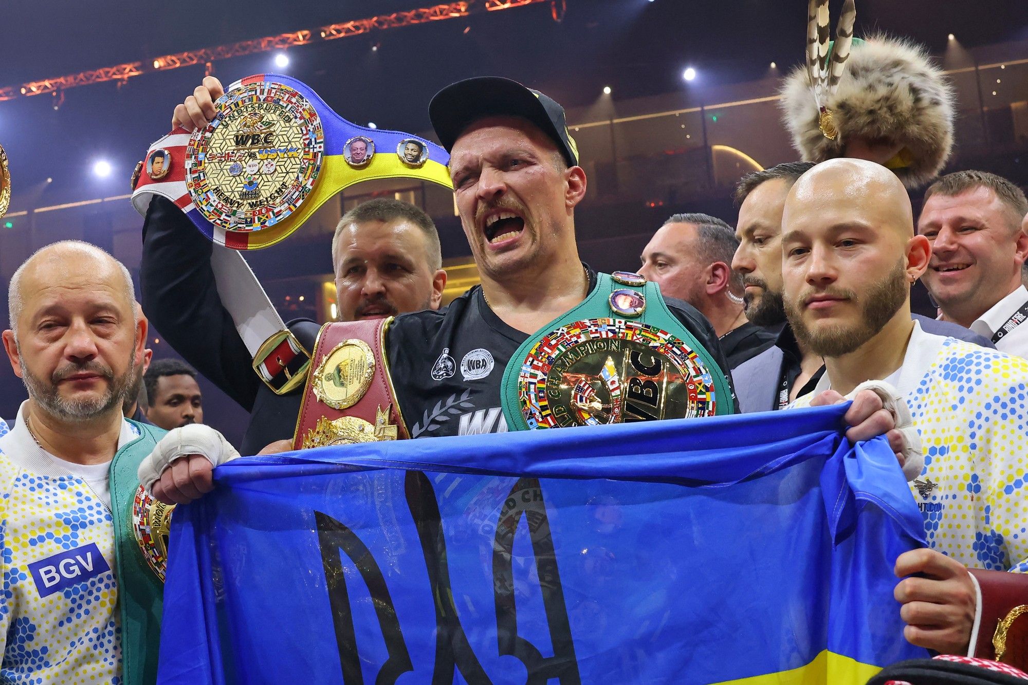 Oleksandr Usyk in tears for late father after historic heavyweight win