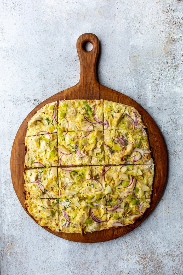 Make your own flammkuchen and pair it with white wine
