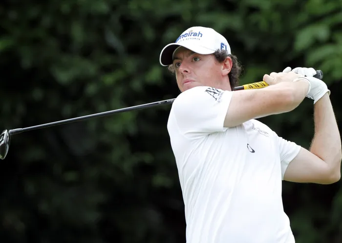 Rory trails Bjorn despite late charge