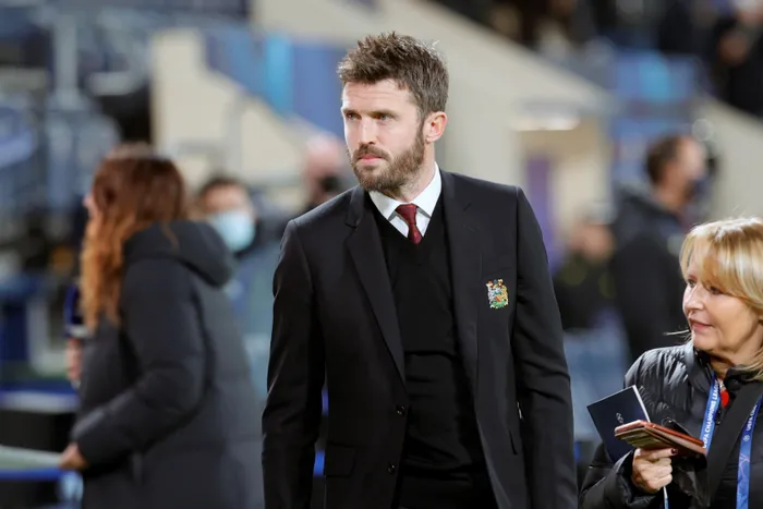 CARRICK TAKES CHARGE AT CARRINGTON AS MAN CITY LIE IN WAIT